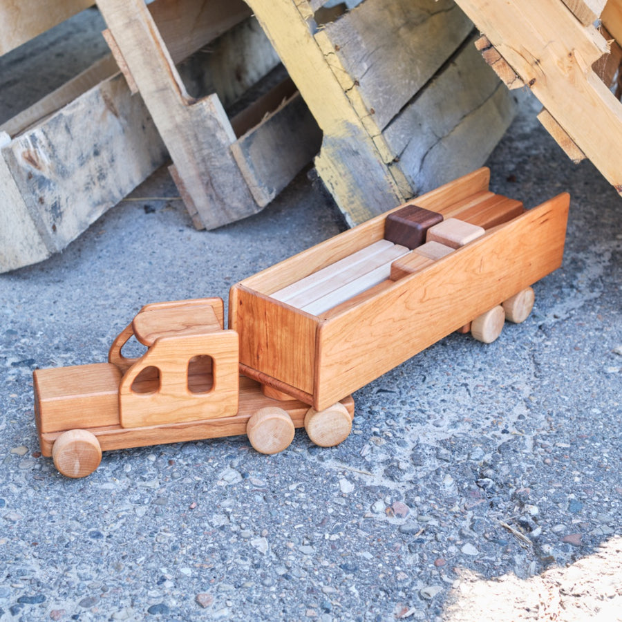 Long Semi-Truck – Camden Rose Inc. / Palumba